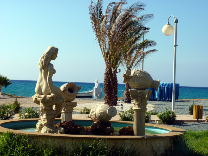Mermaid statue and amphora fountain on Cyprus - Mermaids of Earth
