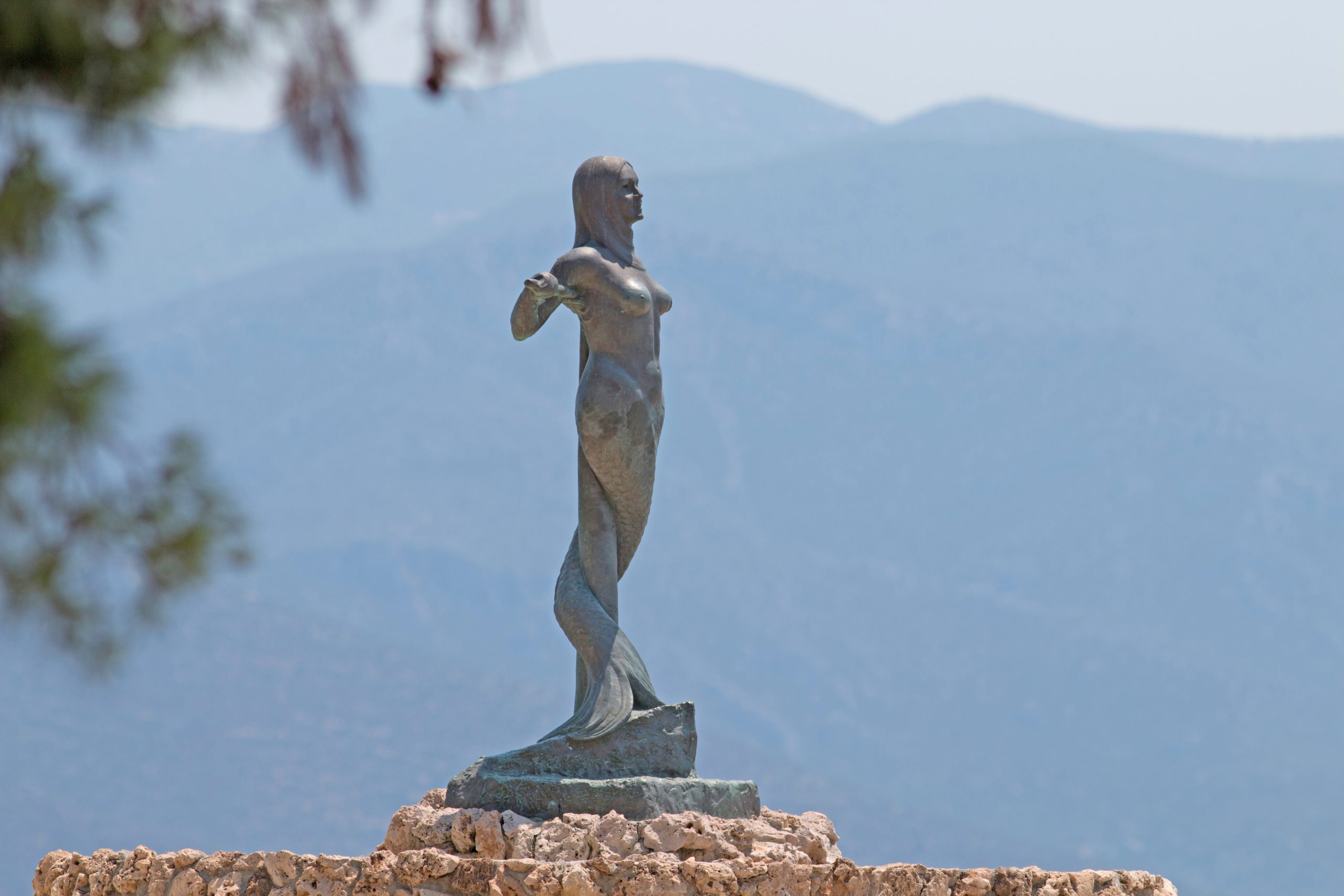 Mermaid Statue at Astros Beach, Greece